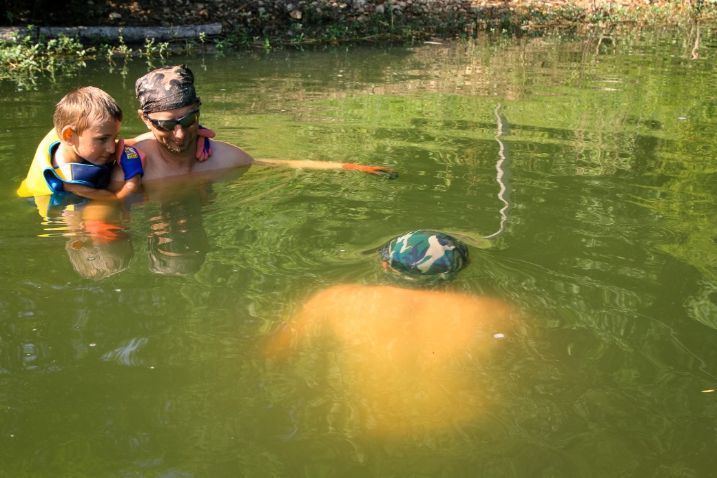 18 Wild Photos of Catfish Noodlers Wrestling Giant Flatheads | Outdoor Life