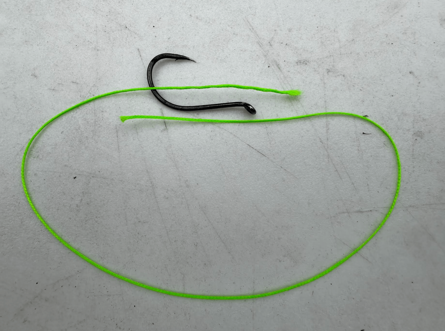 How to Tie a Snell Knot: Step-By-Step Guide With Photos and Video ...