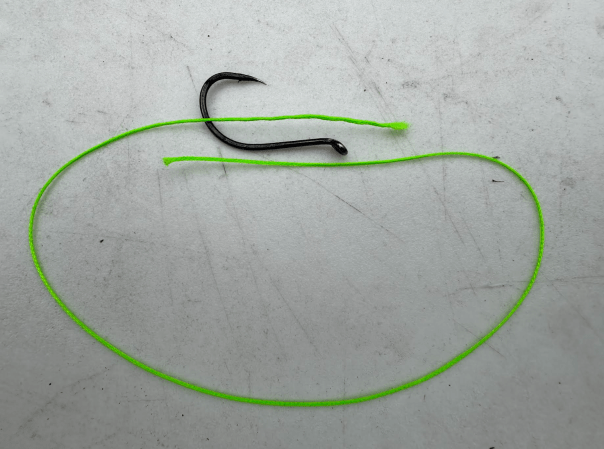 How to Tie a Snell Knot: Step-By-Step Guide With Photos and Video ...