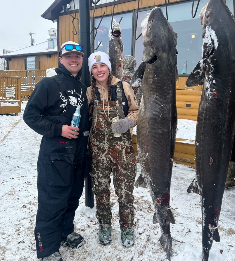 Near-Record Sturgeon Pulled Through the Ice Was So Big It Took Two ...