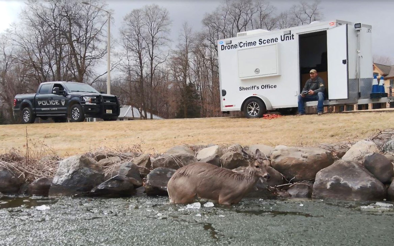 Watch Police Use a Drone to Rescue a Doe and Two Fawns from an Icy Lake ...